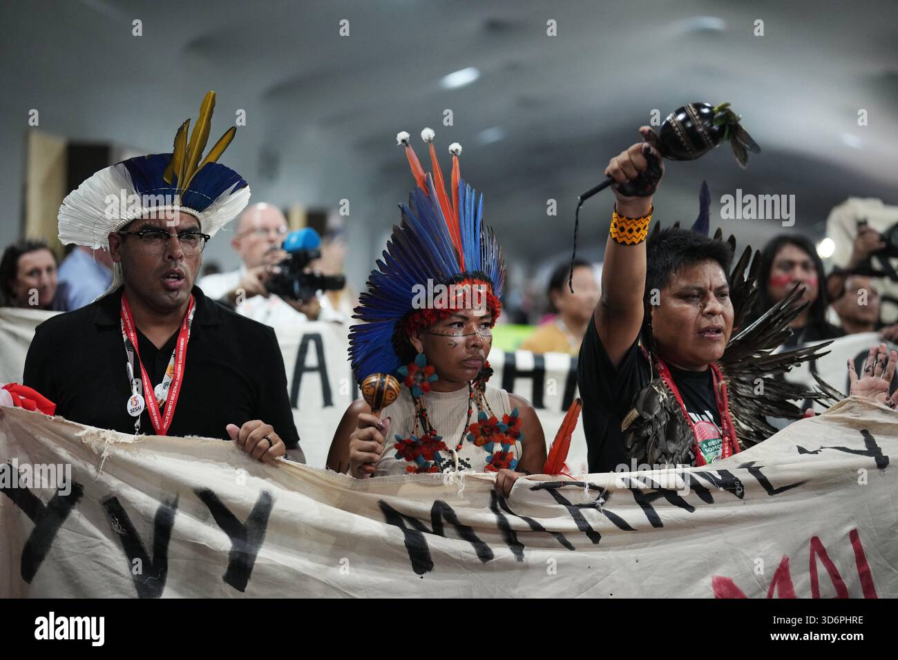 Indigenous activists participate in a protest at the COP30 U.N. Climate ...