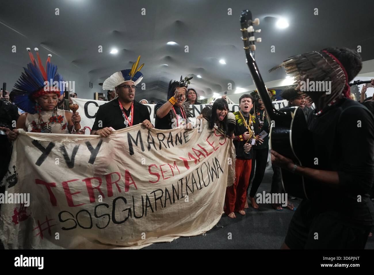 Indigenous activists participate in a protest at the COP30 U.N. Climate ...