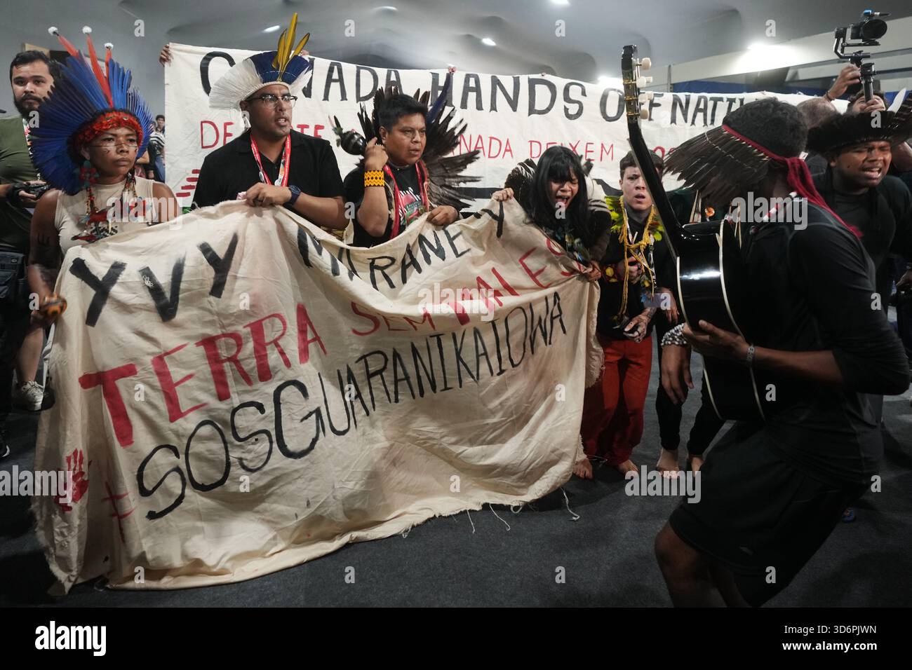 Indigenous activists participate in a protest at the COP30 U.N. Climate ...