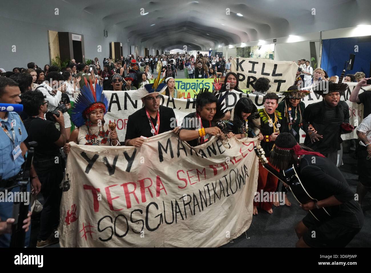 Indigenous activists participate in a protest at the COP30 U.N. Climate ...