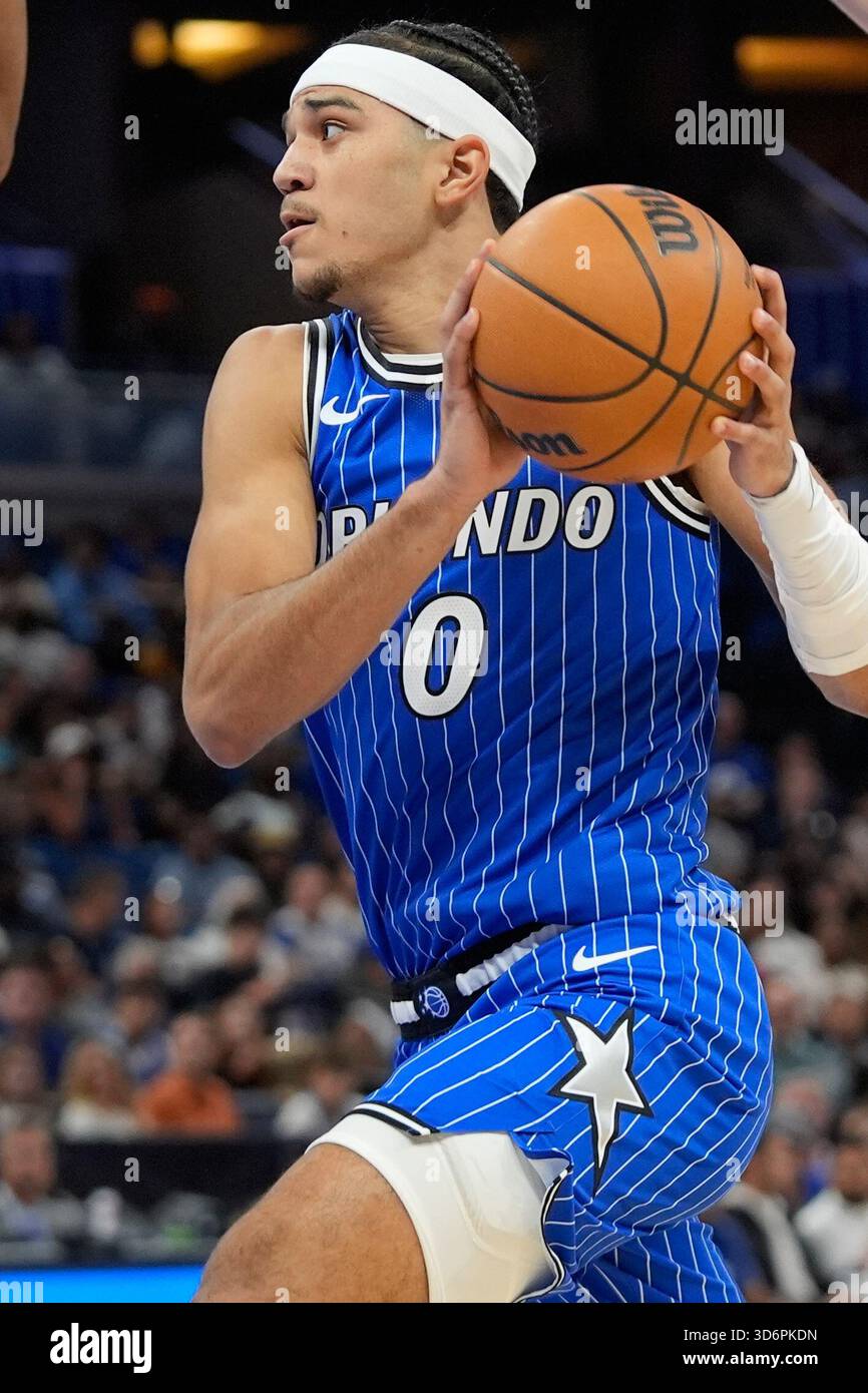 Orlando Magic guard Anthony Black (0) drives to the basket against the ...