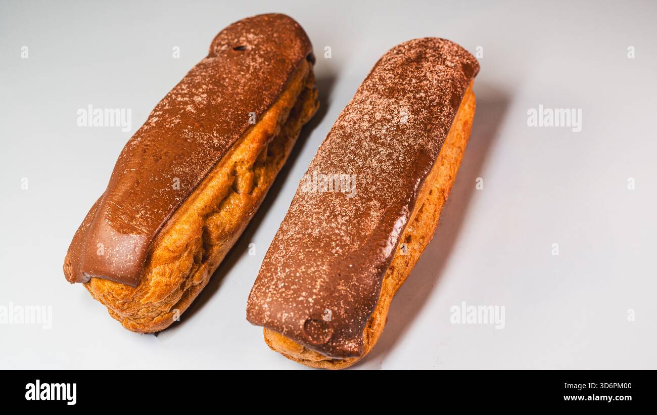 Elegant chocolate eclairs filled with creamy Irish liquor-infused ...