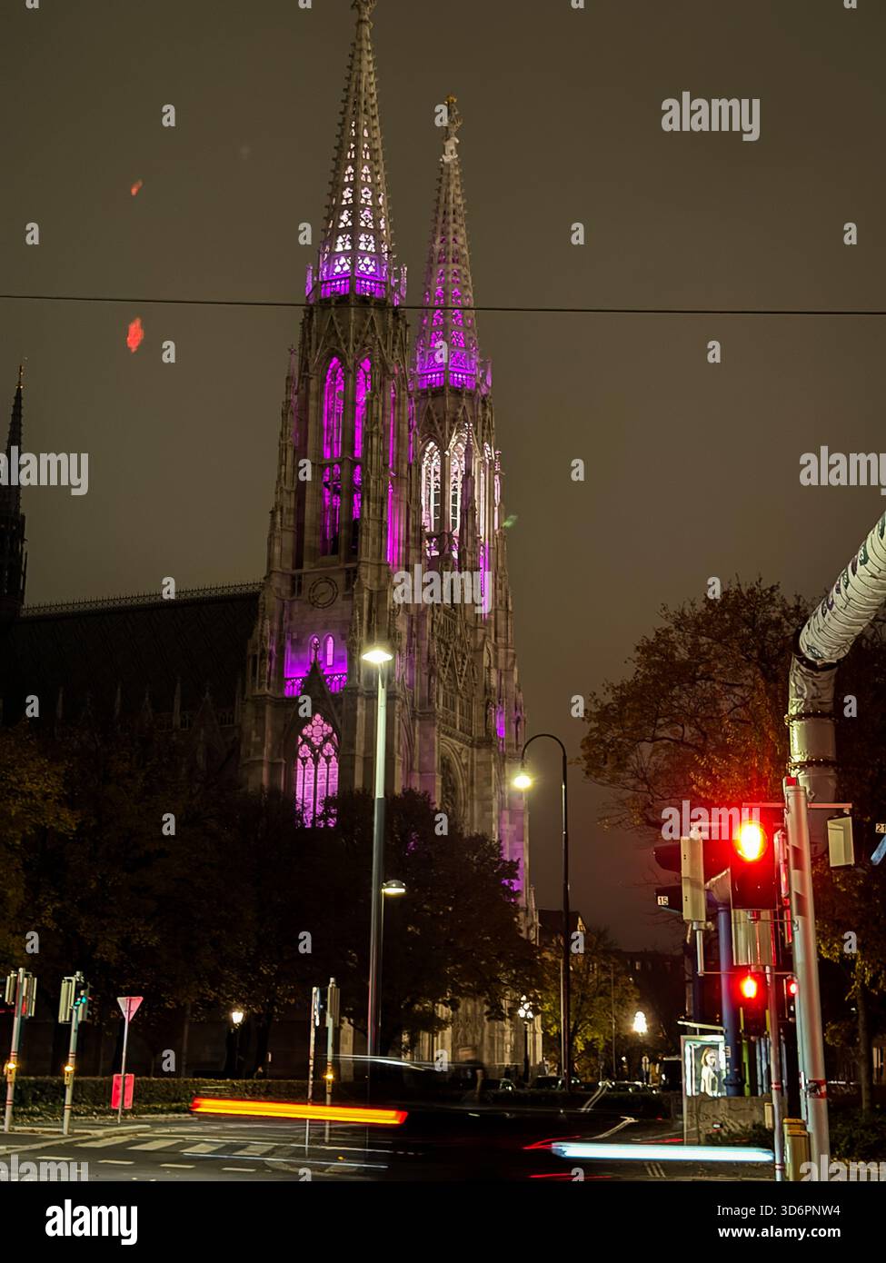 Votivkirche Vienna at Night with Pink Illuminated Facade Stock Photo ...