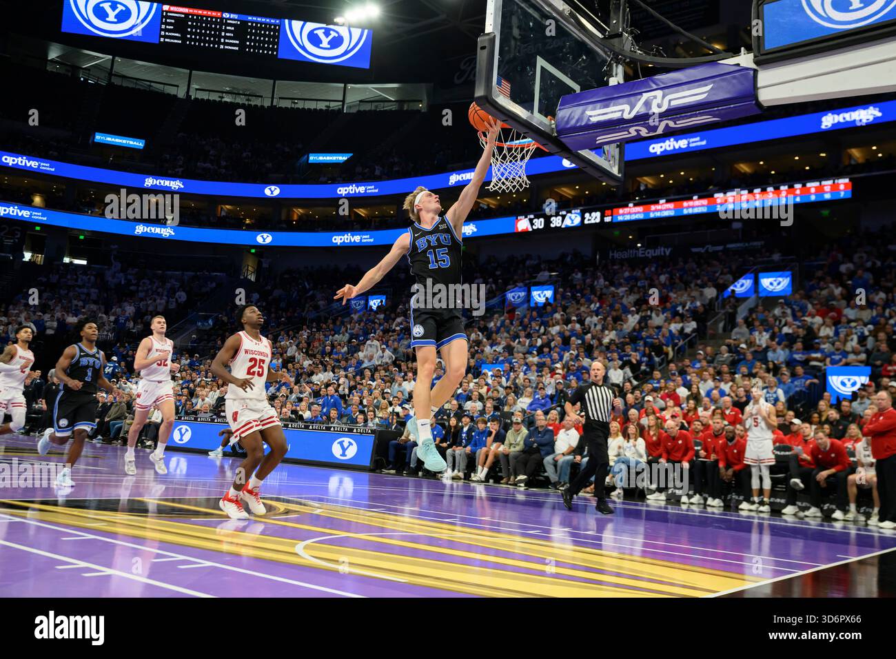 BYU guard Richie Saunders (15) lays the ball into the basket during the ...