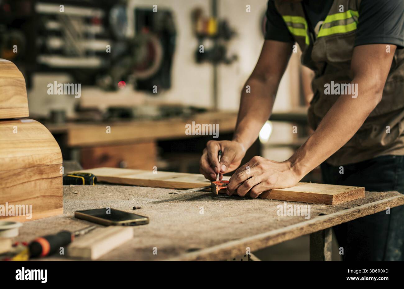 Carpenter using vernier calipers hi-res stock photography and images ...