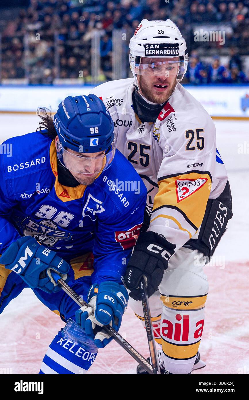 Daniel Vozenilek #96 (EV Zug) and Mirco Muller #25 (HC Lugano ...