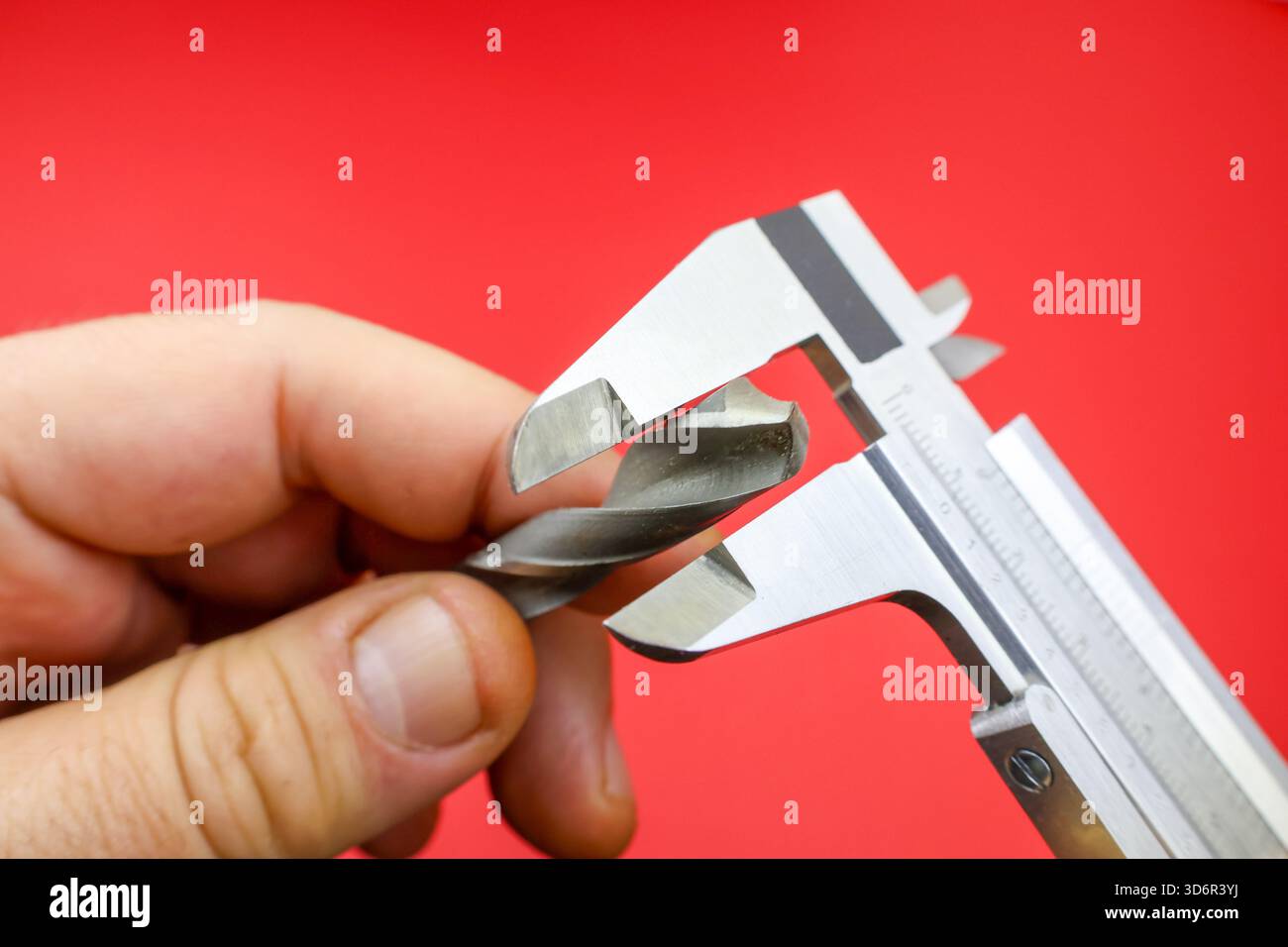 Drill bit measuring using caliper hi-res stock photography and images ...