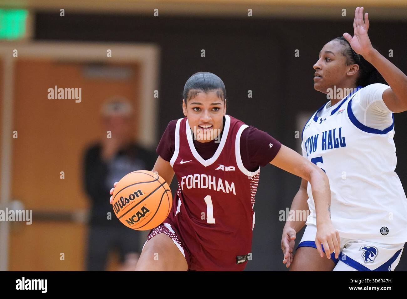 Fordham guard Maysen Hill (1) drives the ball down court during an NCAA basketball game against ...