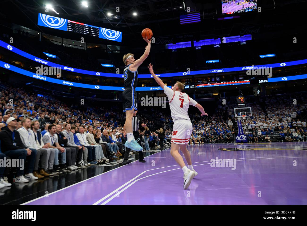 BYU guard Richie Saunders (15) shoots the ball over Wisconsin guard ...