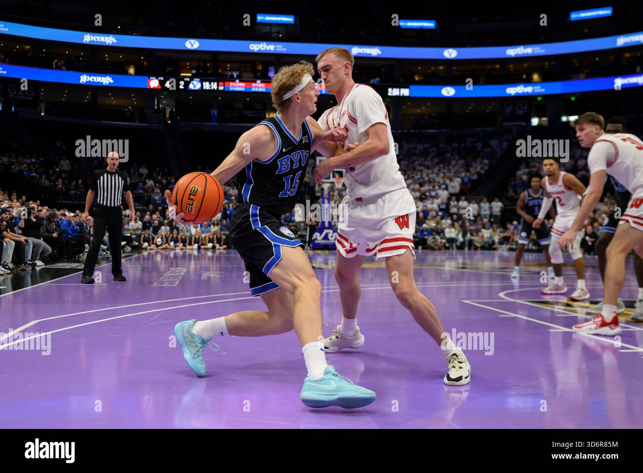 BYU guard Richie Saunders (15) looks to pass the ball around the ...