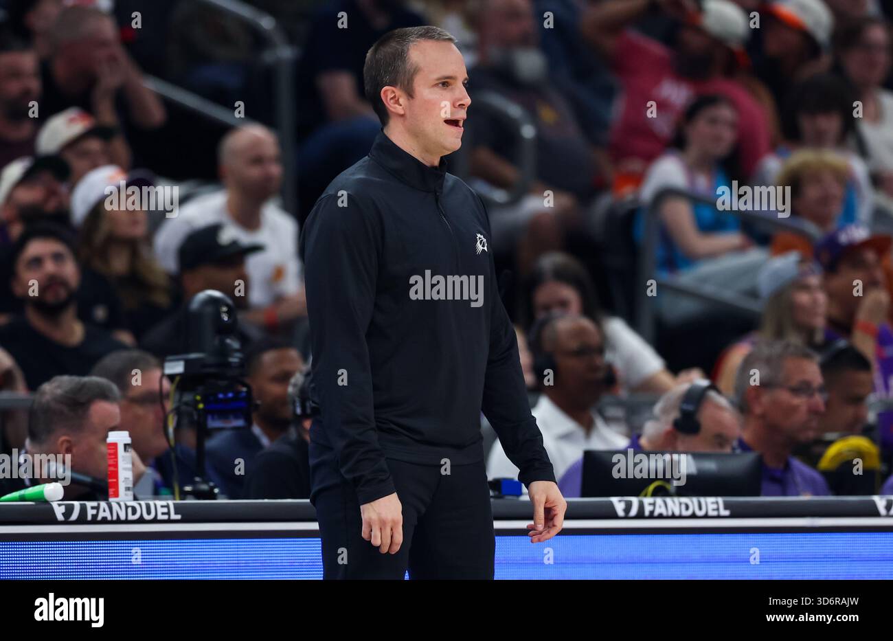 Phoenix Suns head coach Jordan Ott looks on during the first half of an ...