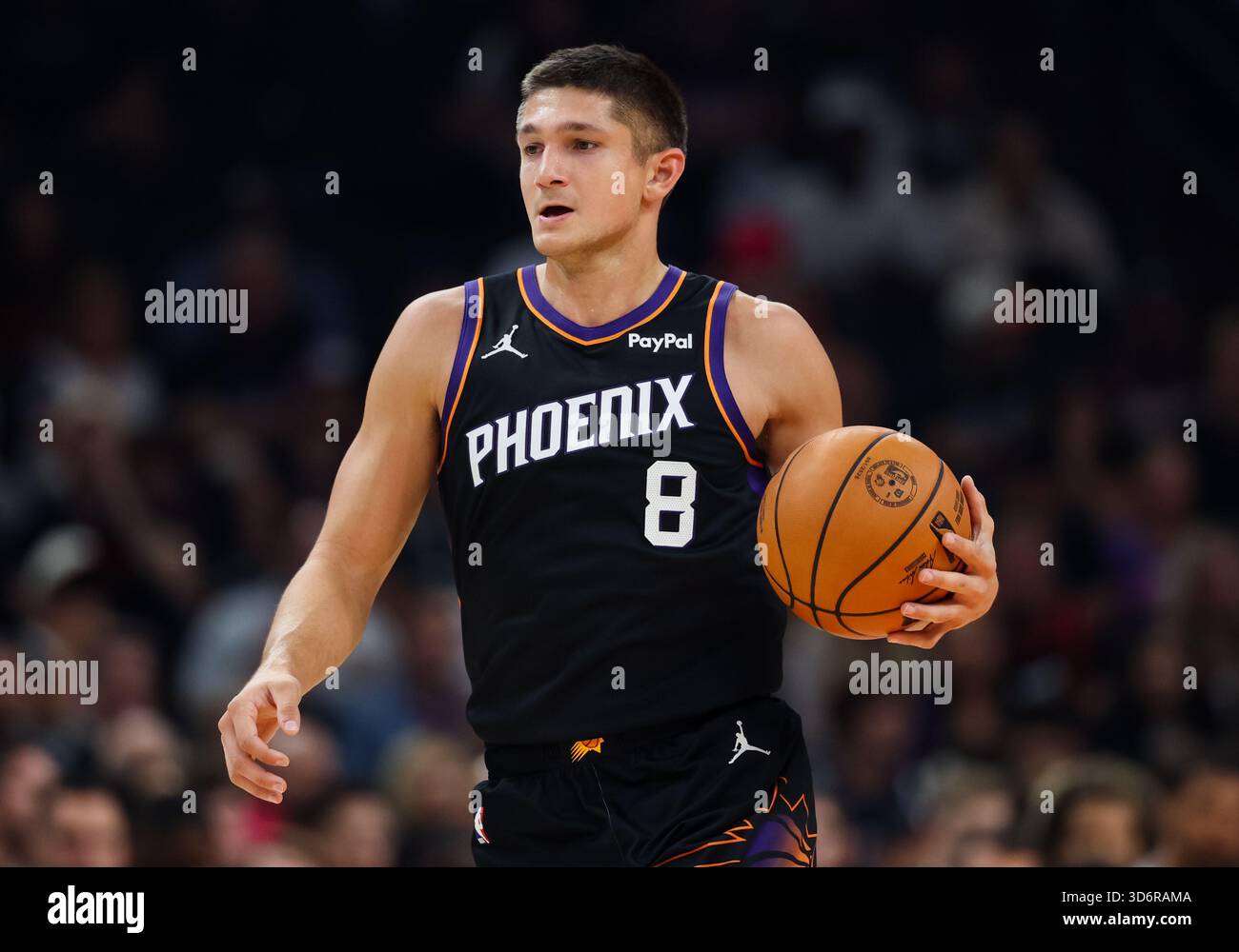 Phoenix Suns guard Grayson Allen (8) dribbles during the first half of ...