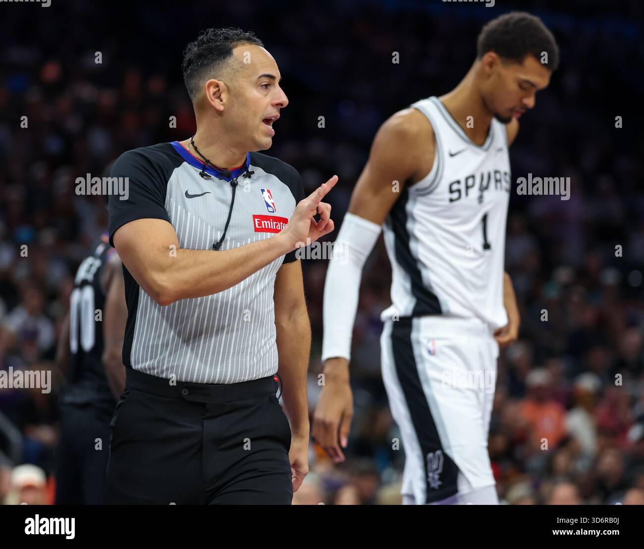 Referee Ray Acosta makes a call during the second half of an NBA ...