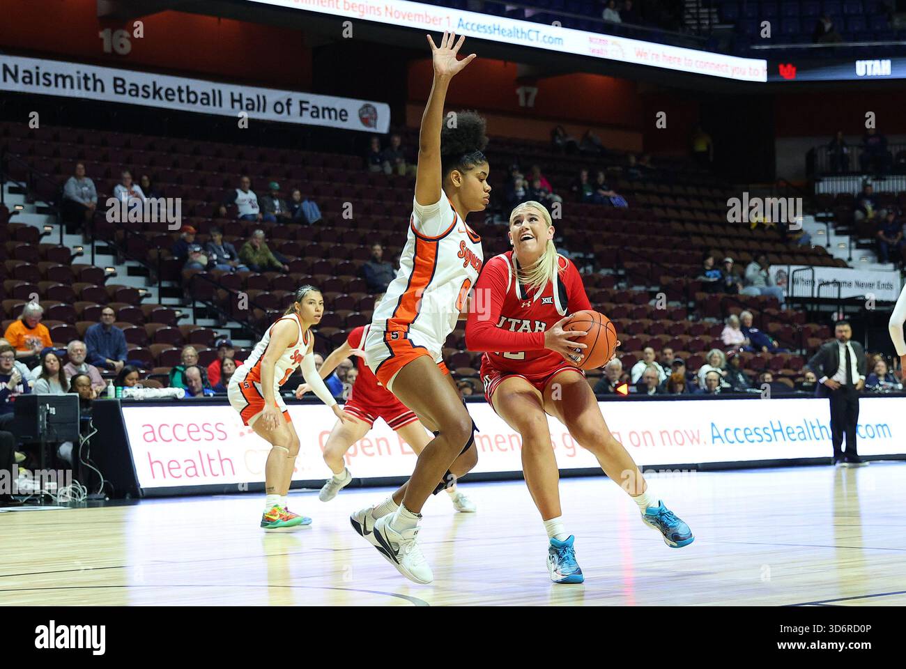 UNCASVILLE, CT - NOVEMBER 21: Chyra Evans #12 of the Utah Utes defended ...