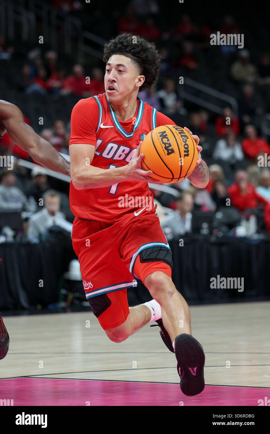 November 21, 2025: New Mexico Lobos guard Uriah Tenette (4) drives to the basket during the ...