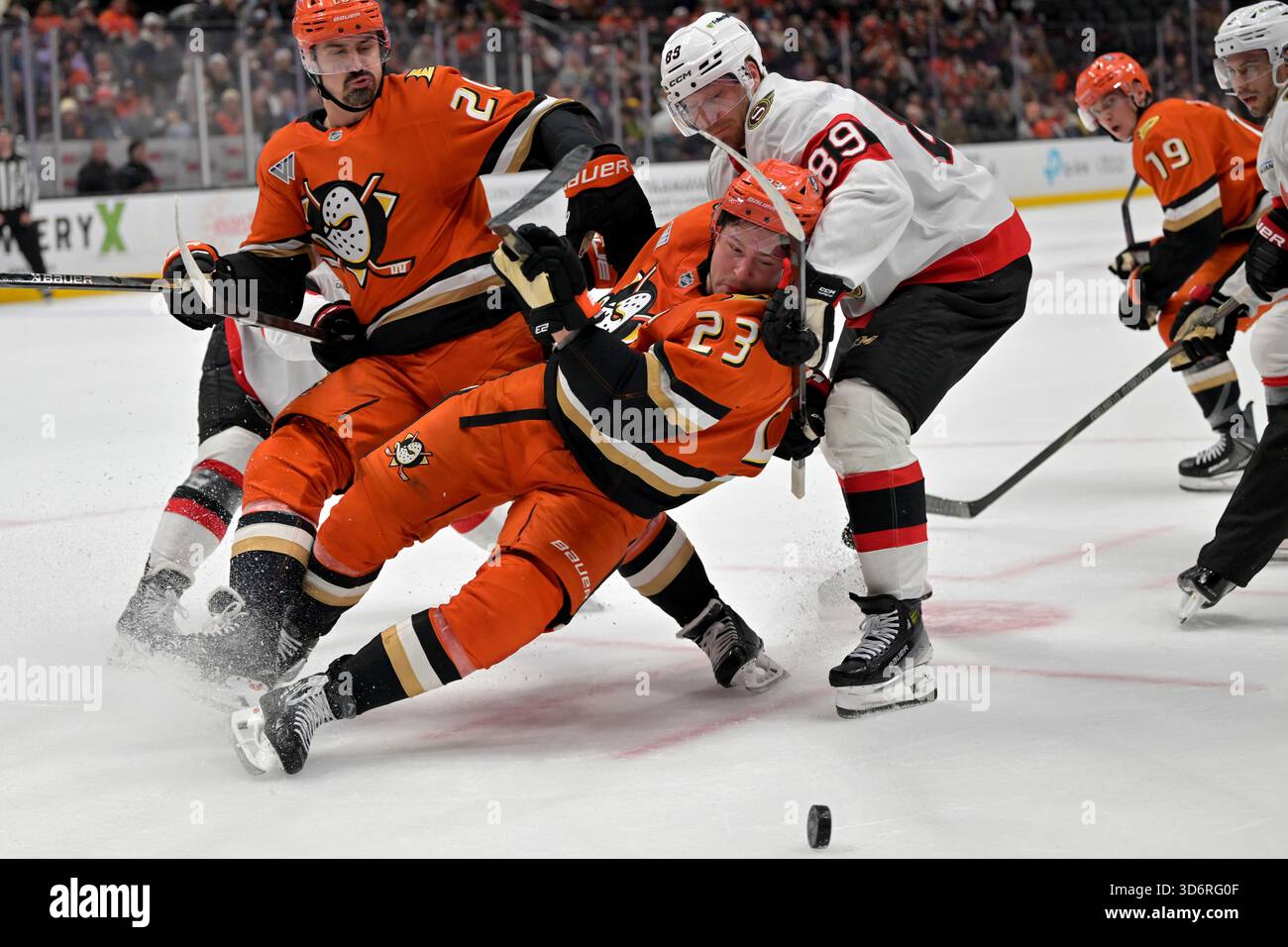 Anaheim Ducks center Mason McTavish (23) and Ottawa Senators center ...