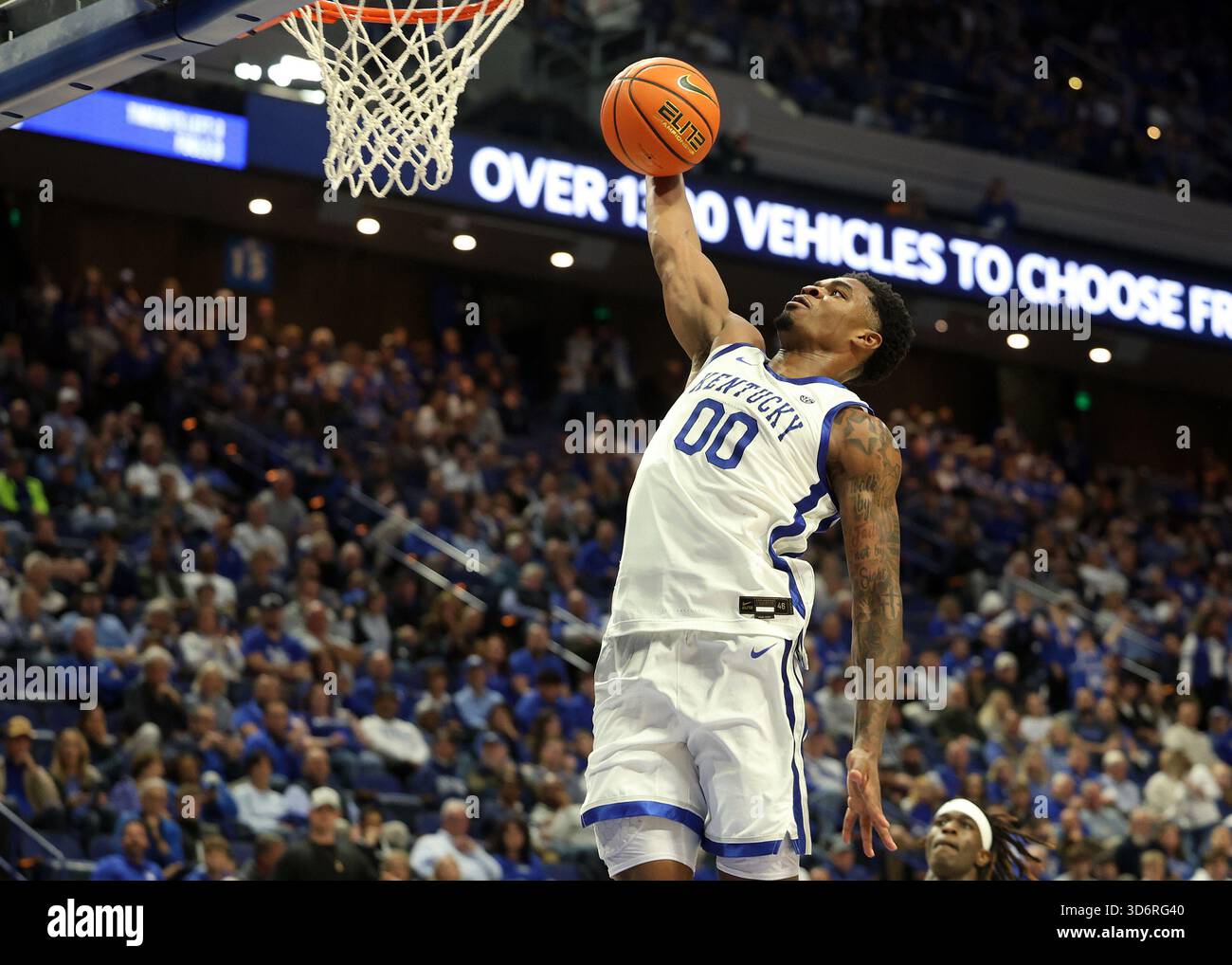 Kentucky's Otega Oweh (00) dunks during the second half of an NCAA ...