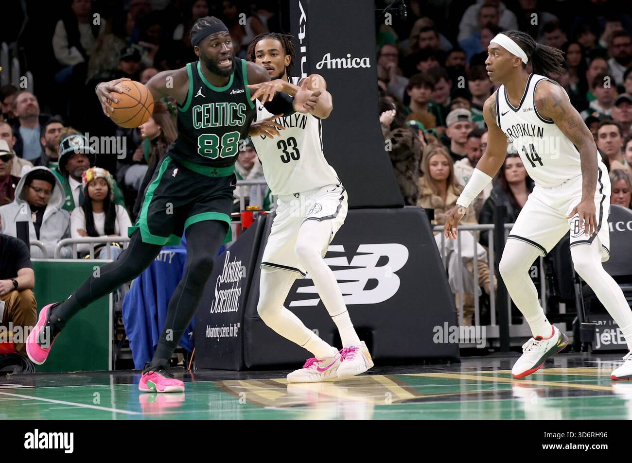 Boston Celtics center Neemias Queta (88) defends the ball from Brooklyn ...
