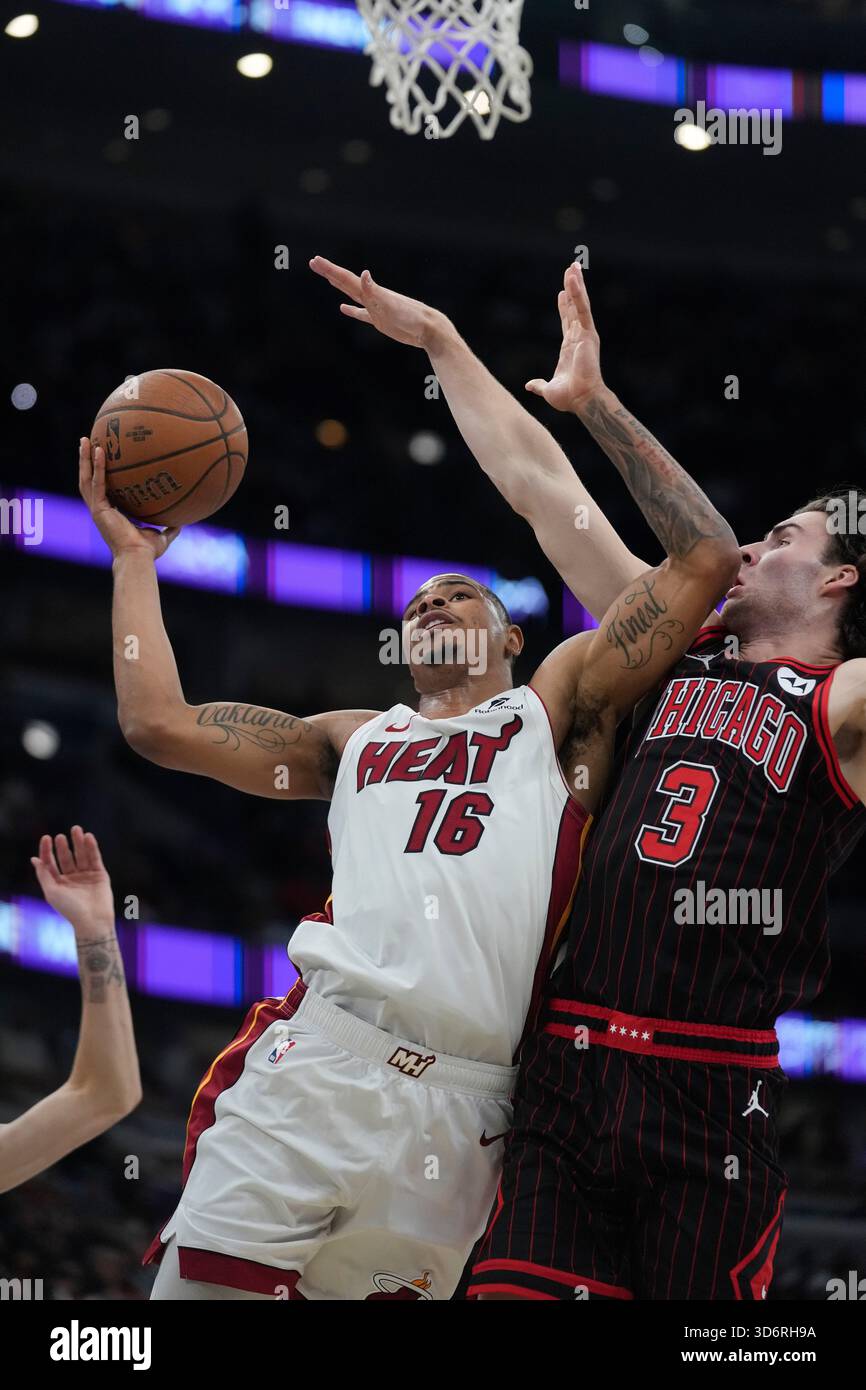 Chicago Bulls guard Josh Giddey (3) blocks a shot by Miami Heat forward ...