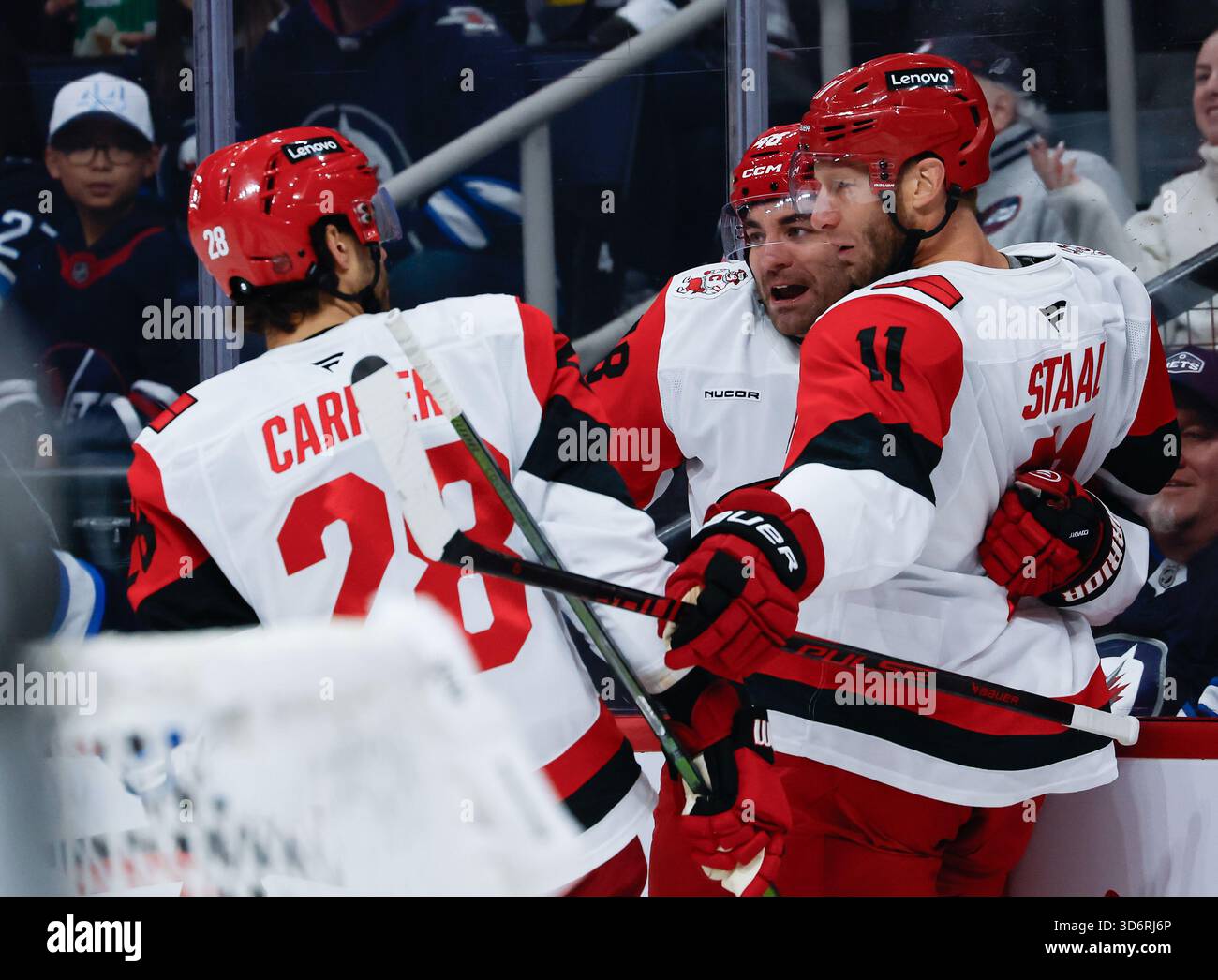 Carolina Hurricanes' William Carrier (28), Jordan Staal (11) and Jordan ...