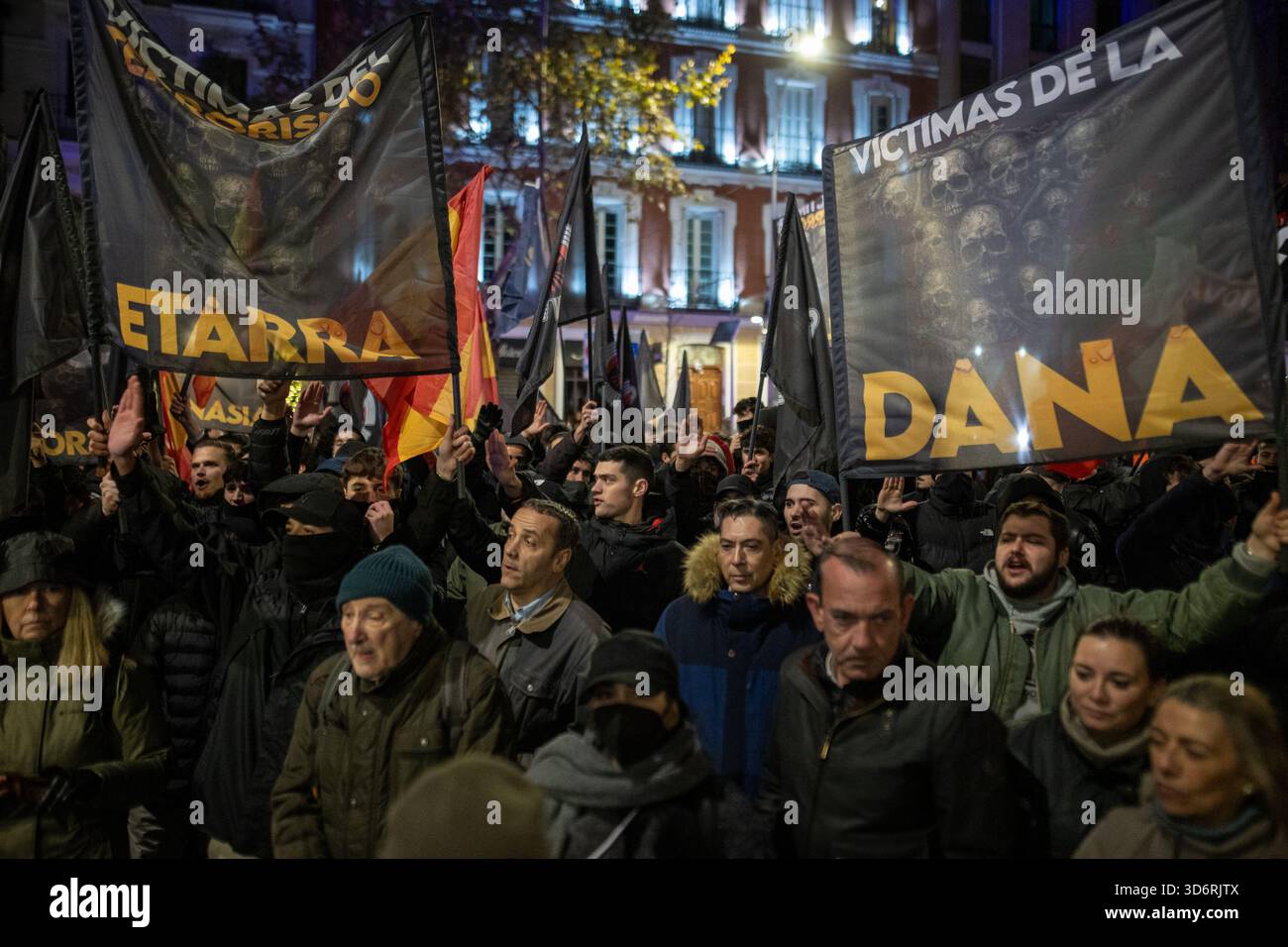 Far-right demonstrators carry banners during a demonstration. The Far ...