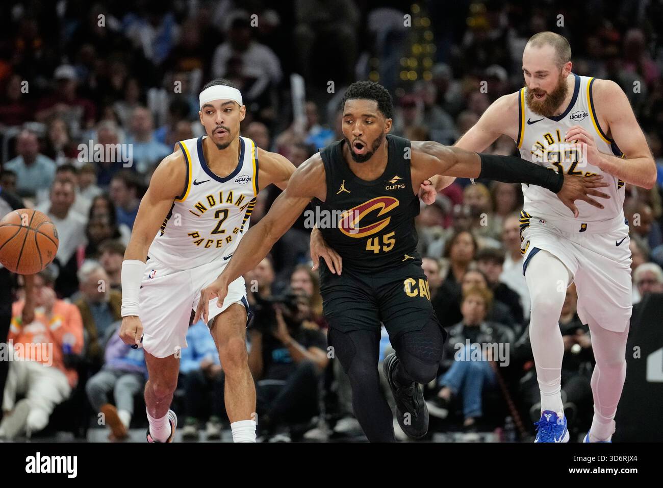 Indiana Pacers guard Andrew Nembhard (2), Pacers center Jay Huff (32) and Cleveland Cavaliers ...
