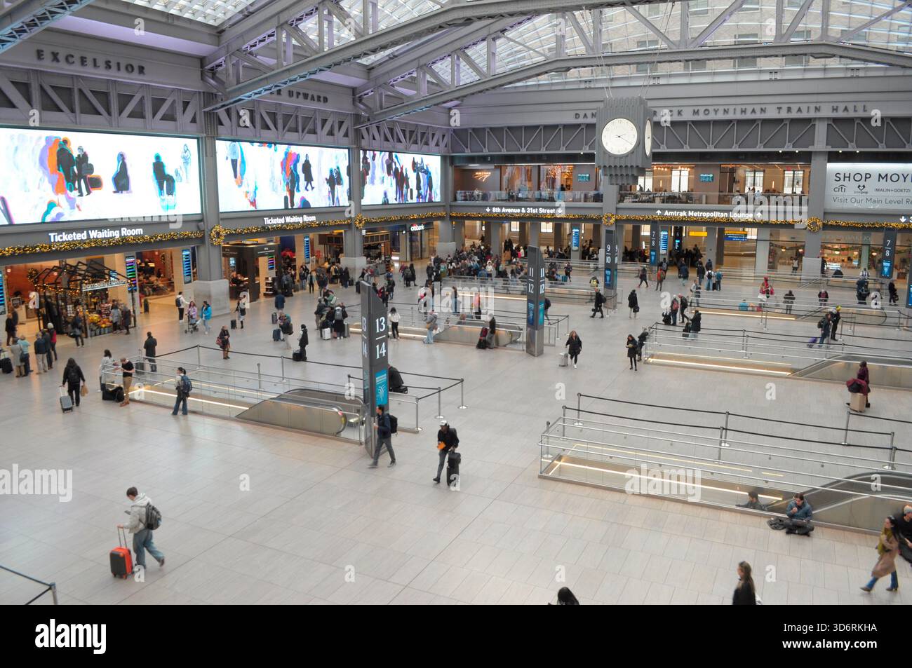 People walk in Moynihan Train Hall in Manhattan, New York City Stock ...