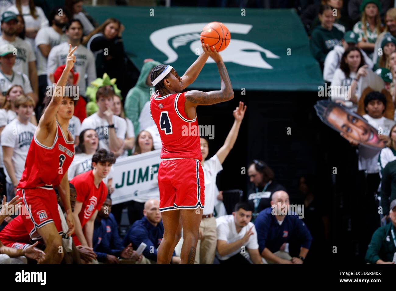 Detroit Mercy forward Keshawn Fisher (4) shoots against Michigan State ...