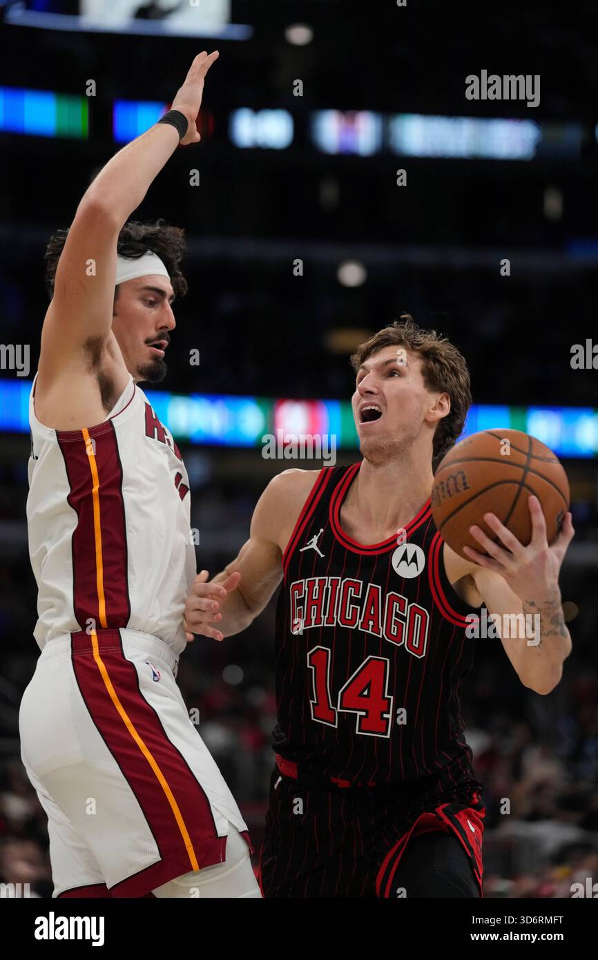 Miami Heat forward Jaime Jaquez Jr., left, guards against Chicago Bulls ...