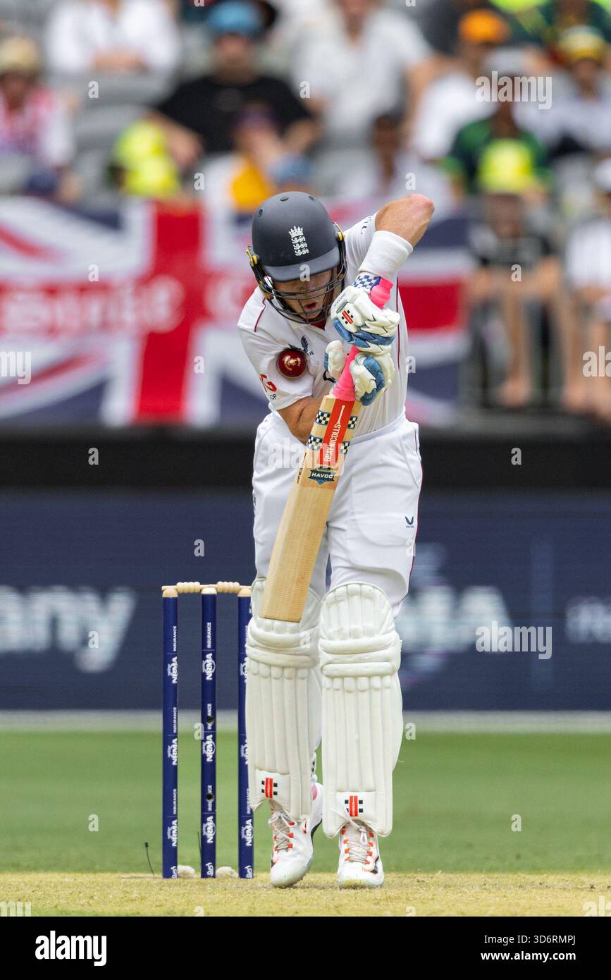 Ollie Pope of England is hit on the body by the ball during the NRMA ...