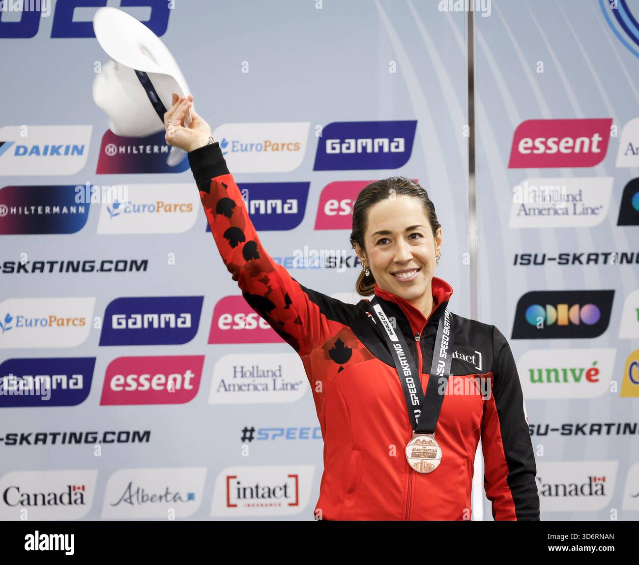 Canada's Valerie Maltais celebrates her third place finish on the ...