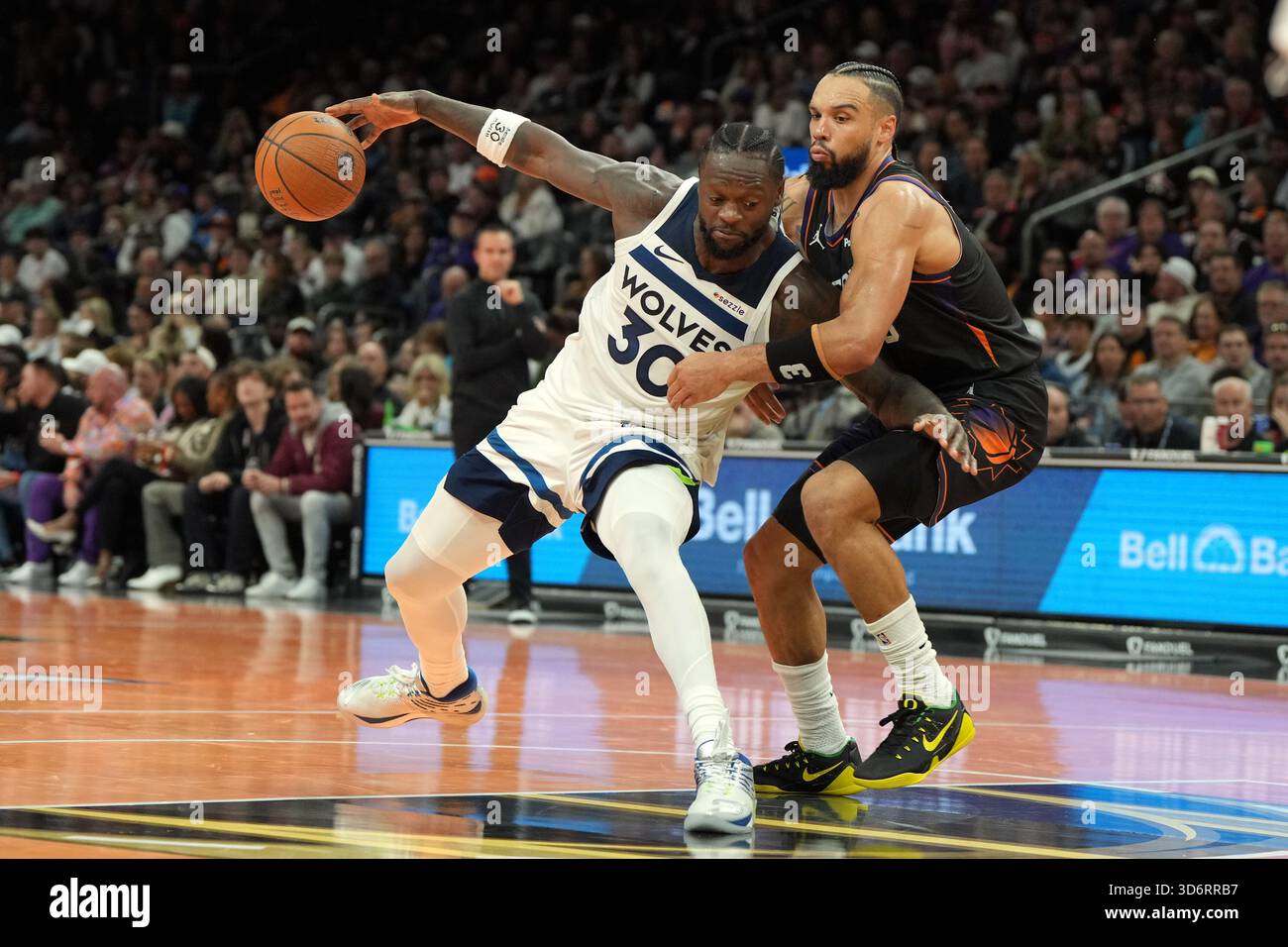 Minnesota Timberwolves forward Julius Randle (30) shields the ball from ...