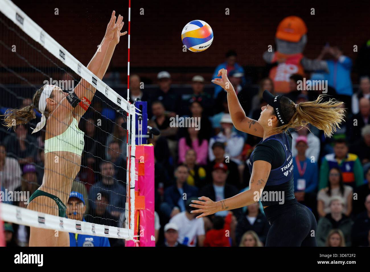 Tina Graudina, left, of Latvia blocks Thamela Coradello Galil of Brazil ...