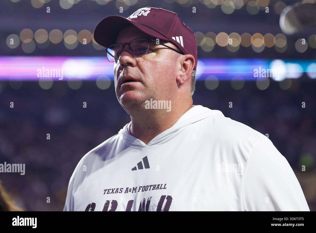 Texas A&M head coach Mike Elco walks off the field at halftime during a ...