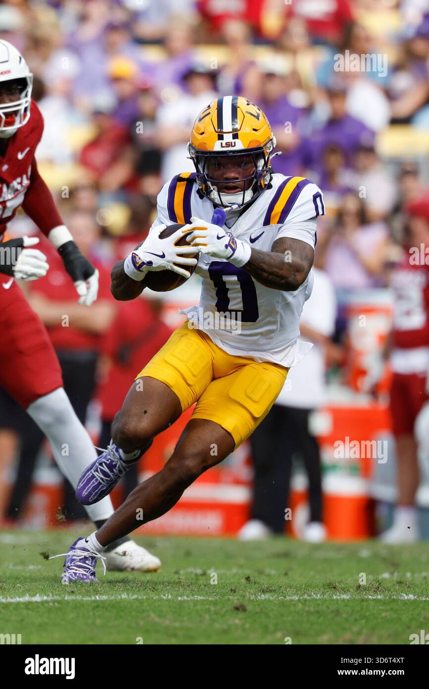 LSU wide receiver Zavion Thomas (0) carries the ball after a reception ...