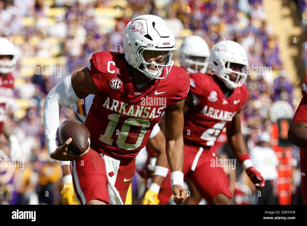 Arkansas quarterback Taylen Green (10) carries the ball on a run during ...