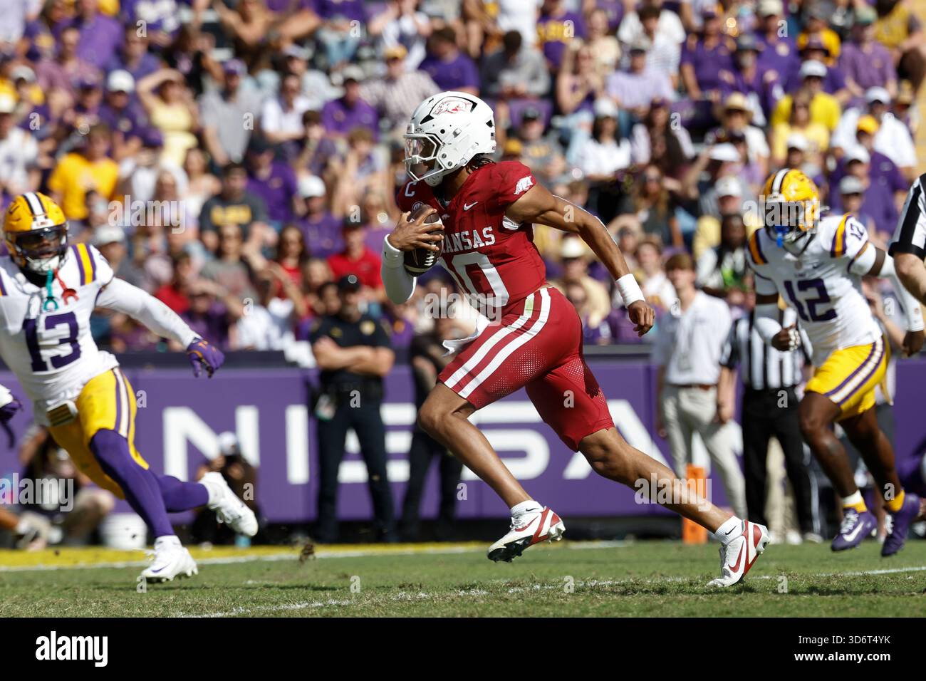 Arkansas quarterback Taylen Green (10) carries the ball on a run during ...