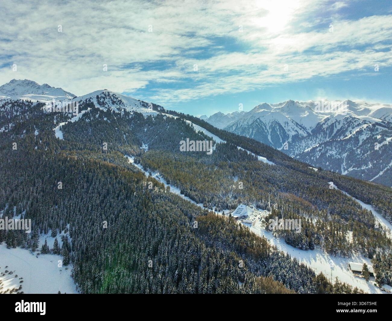 Aerial panoramic view of the lower ski resort base building nestled ...