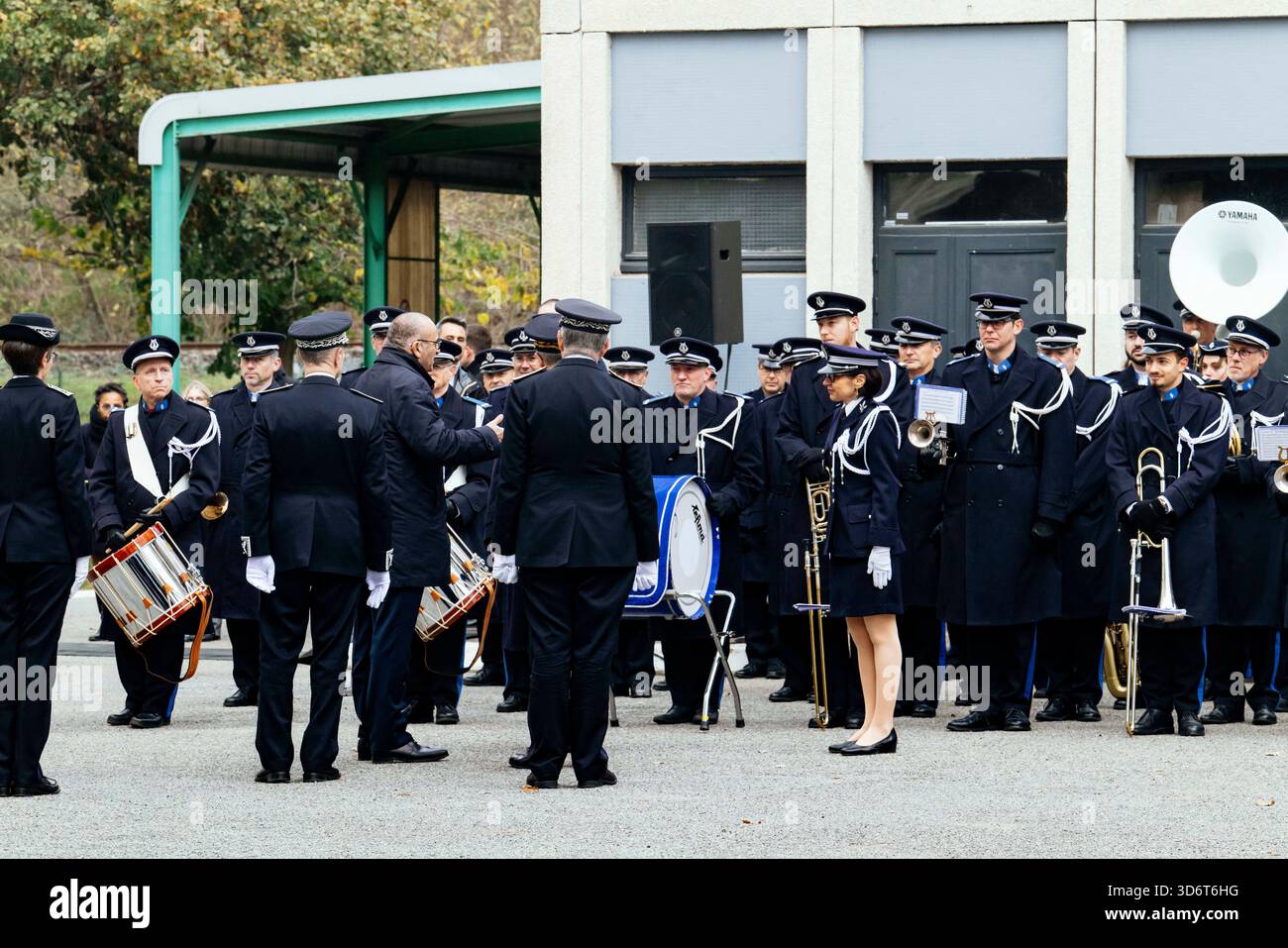 The minister salutes the National Police marching band. National Police ...