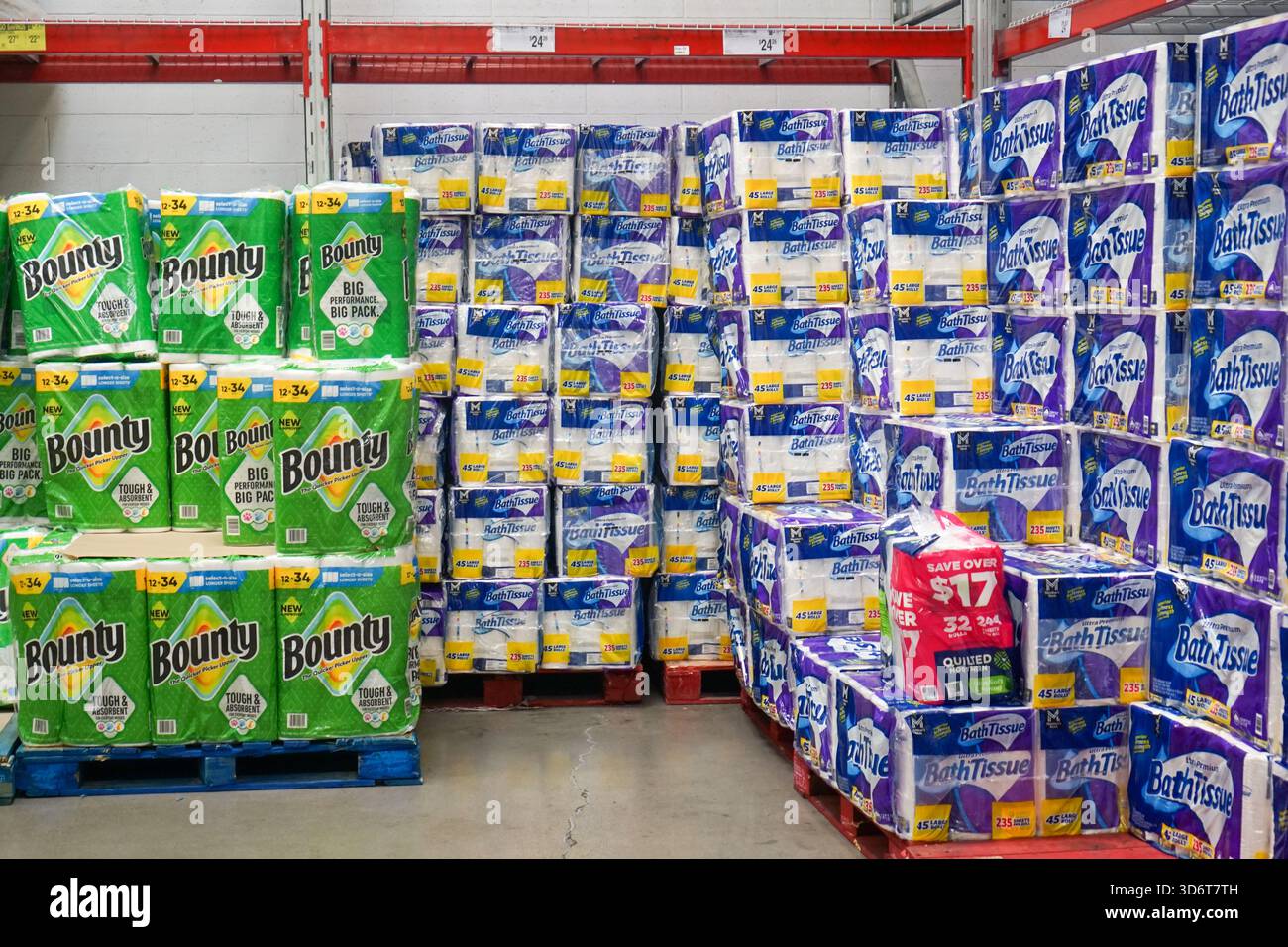 Stacks of Member's Mark toilet paper and Bounty paper towels stacked ...