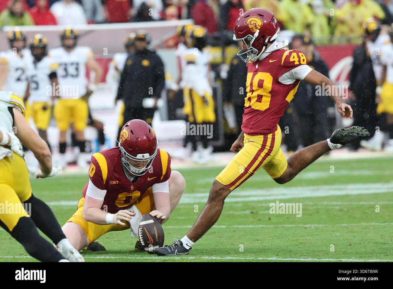 USC kicker Ryan Sayeri (48) kicks a field goal during an NCAA college ...