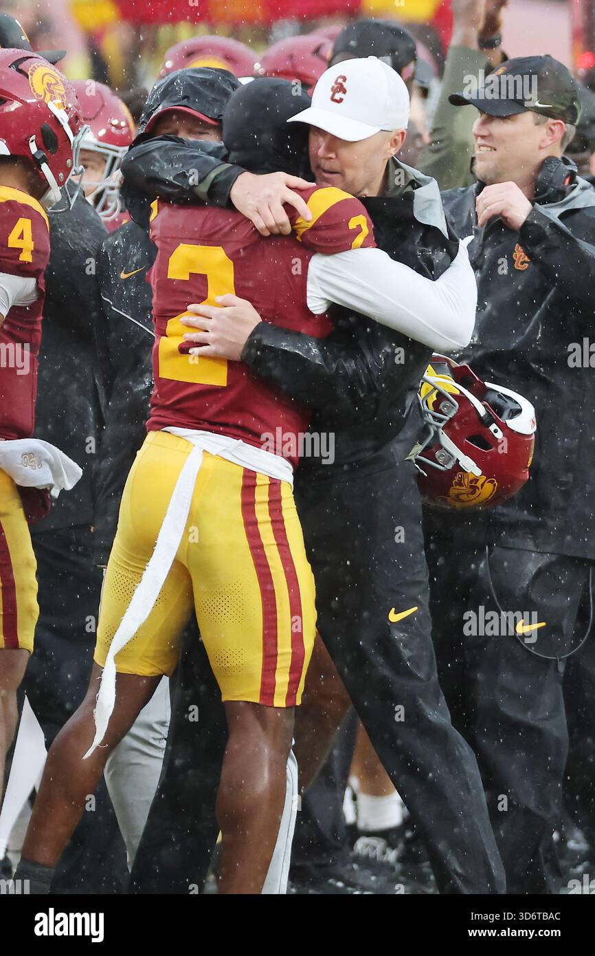 USC head coach Lincoln Riley embraces running back Waymond Jordan (2 ...