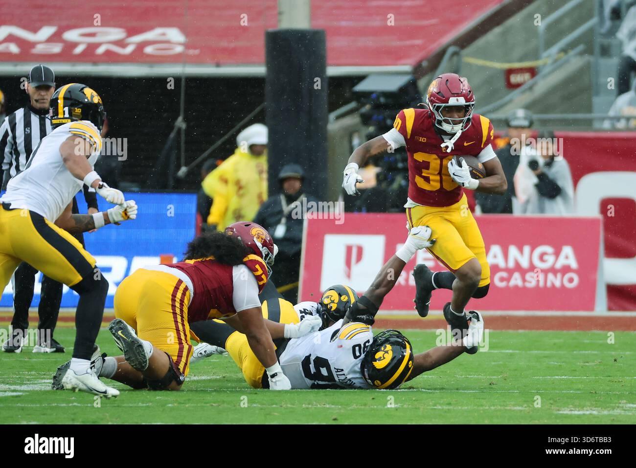 USC running back King Miller (30) runs upfield during an NCAA college ...