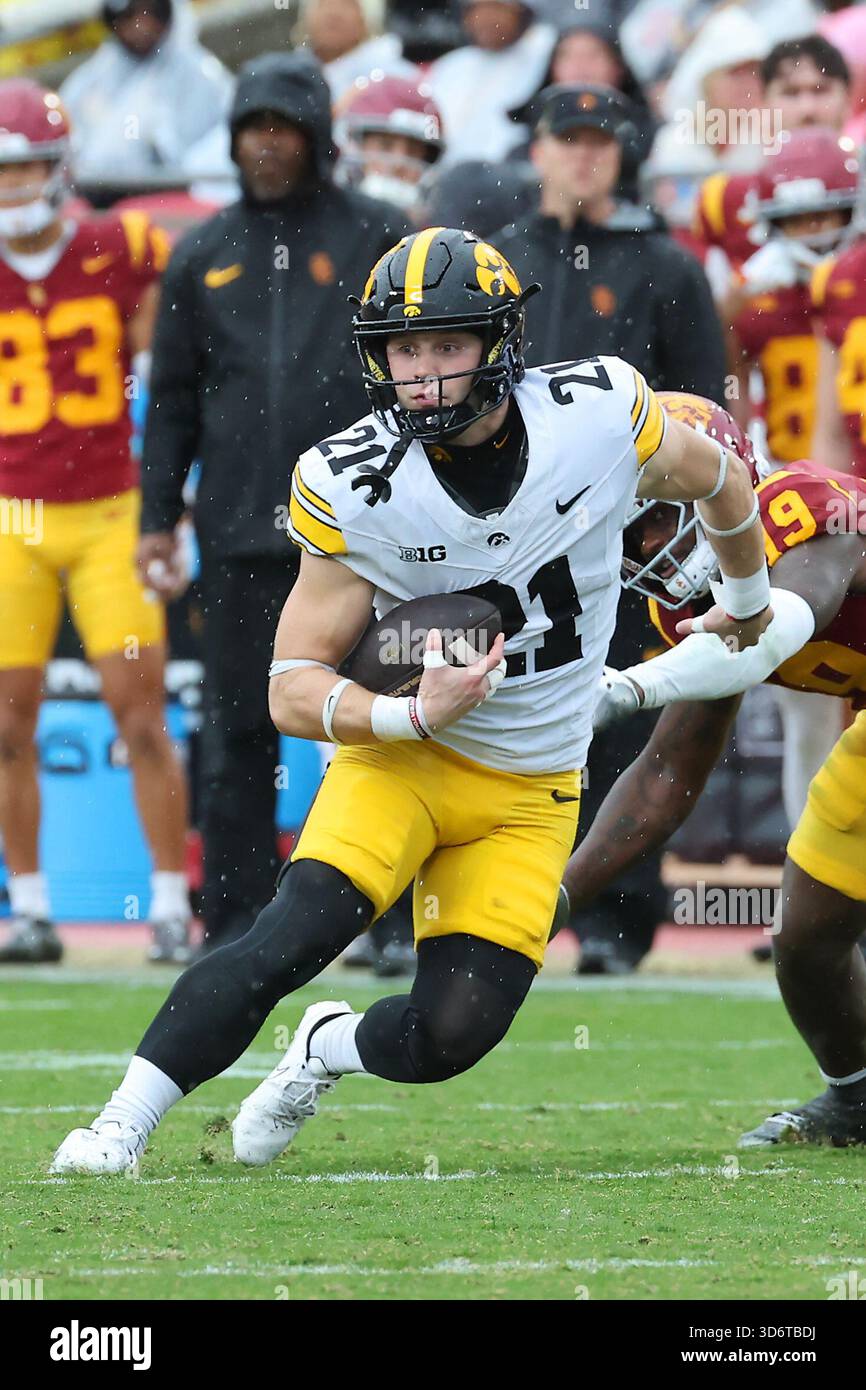 Iowa wide receiver Kaden Wetjen (21) runs with a reception during an ...