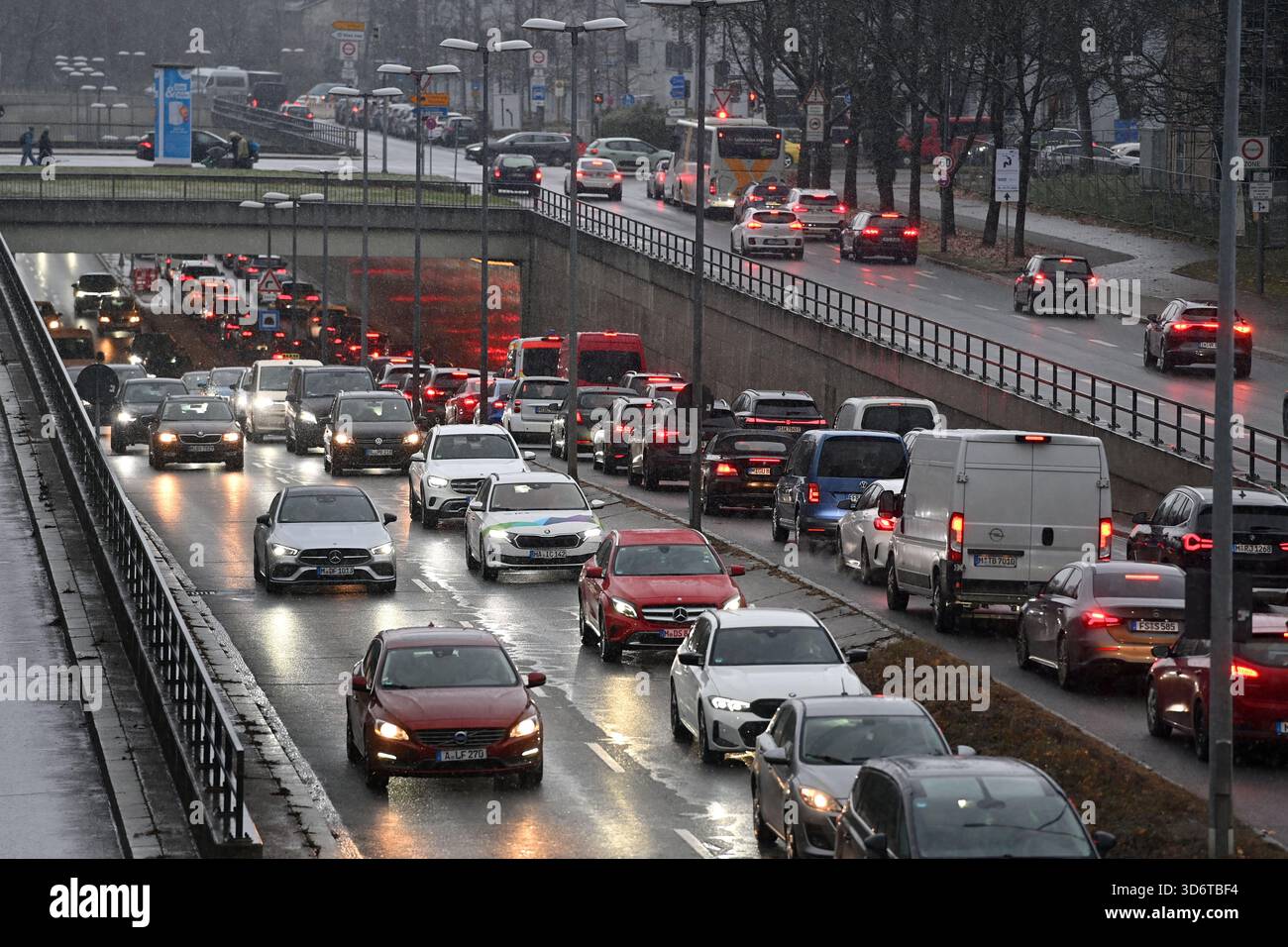 Evening dense street traffic on the Middle Ring in Munich. Traffic jam ...