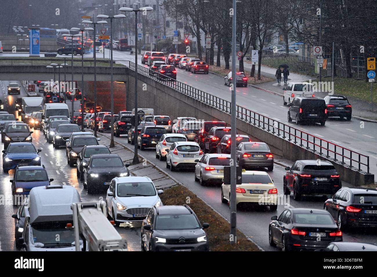 Evening dense street traffic on the Middle Ring in Munich. Traffic jam ...
