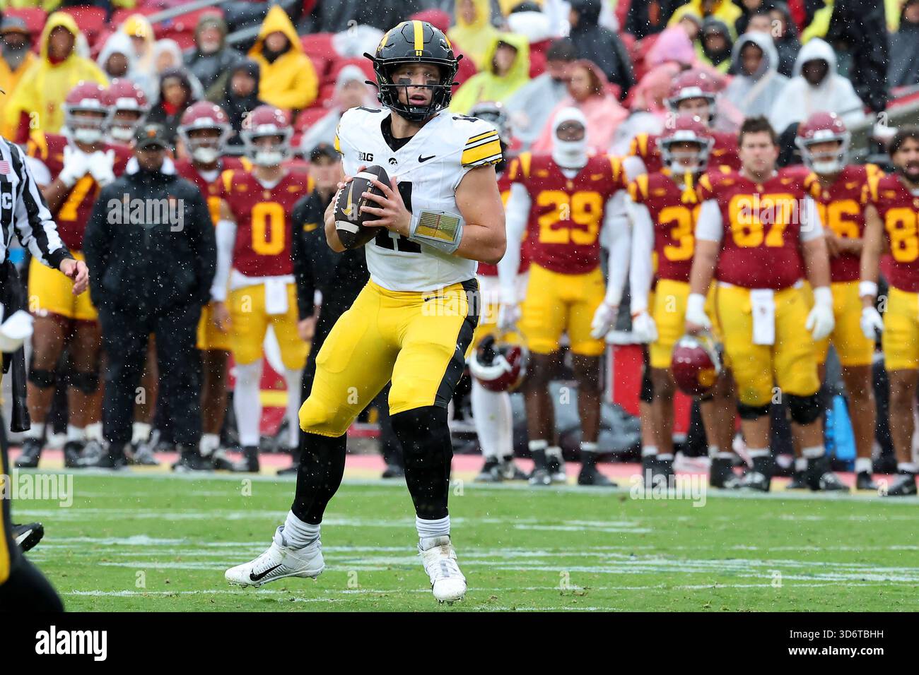 Iowa quarterback Mark Gronowski (11) sets up to pass during an NCAA ...