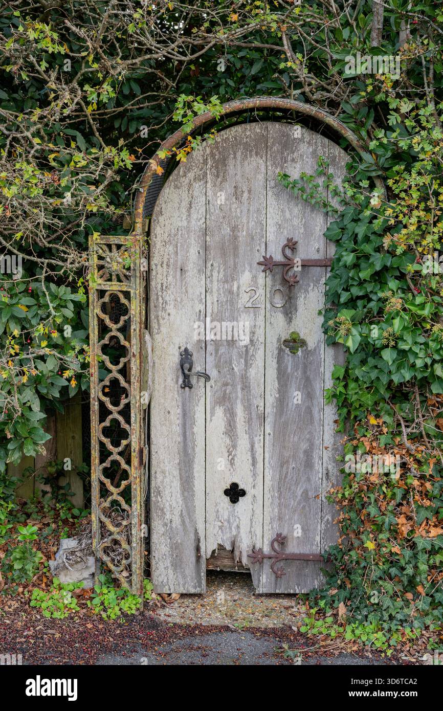 vintage or antique solid oak doorway or garden gate with wrought iron ...