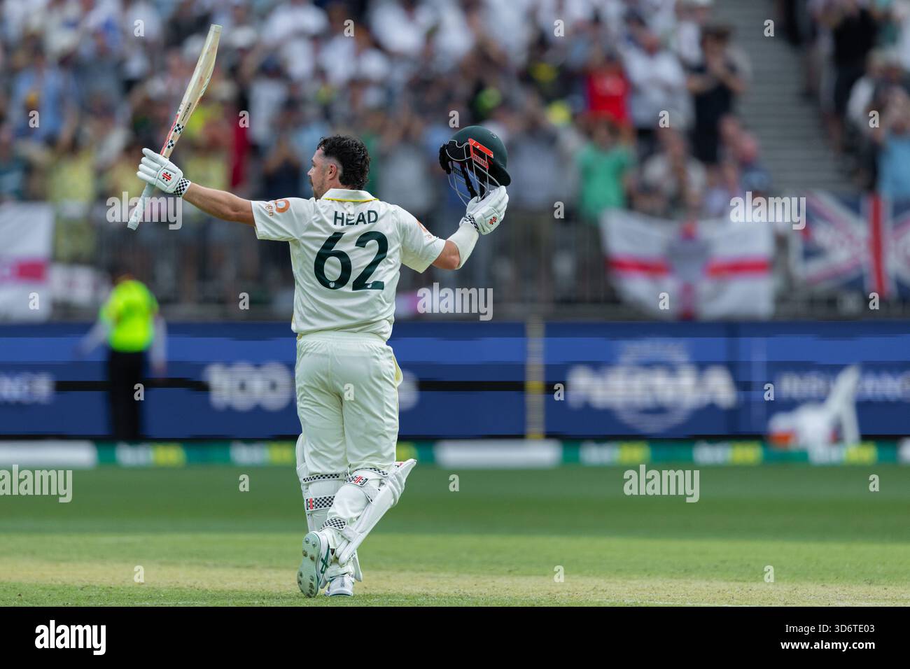 Travis Head of Australia raises bat after scoring a century during the ...