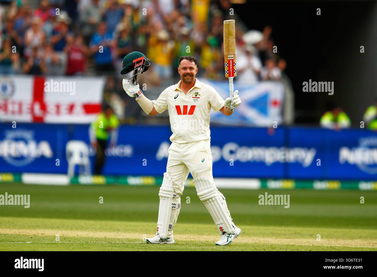 Australia's Travis Head celebrates his century on day two of the first ...